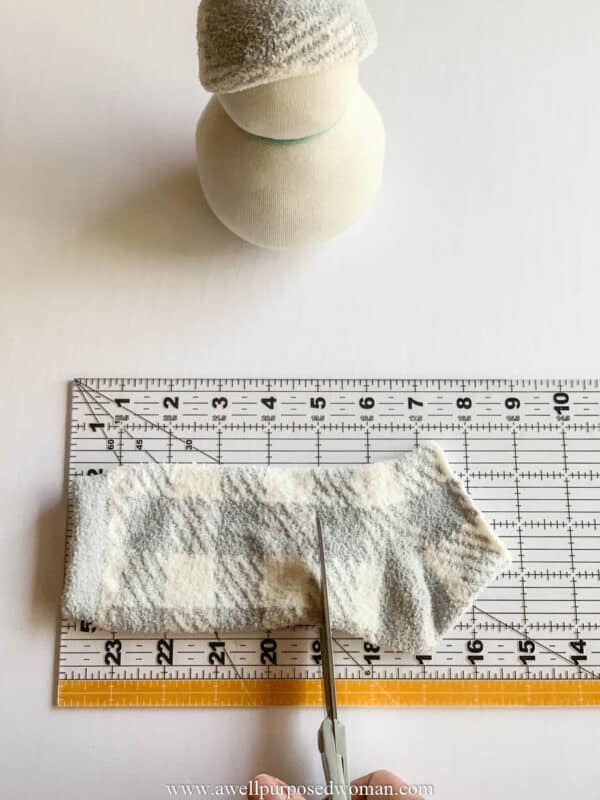 How to Make a Sock Snowman from Old Socks - A Well Purposed Woman